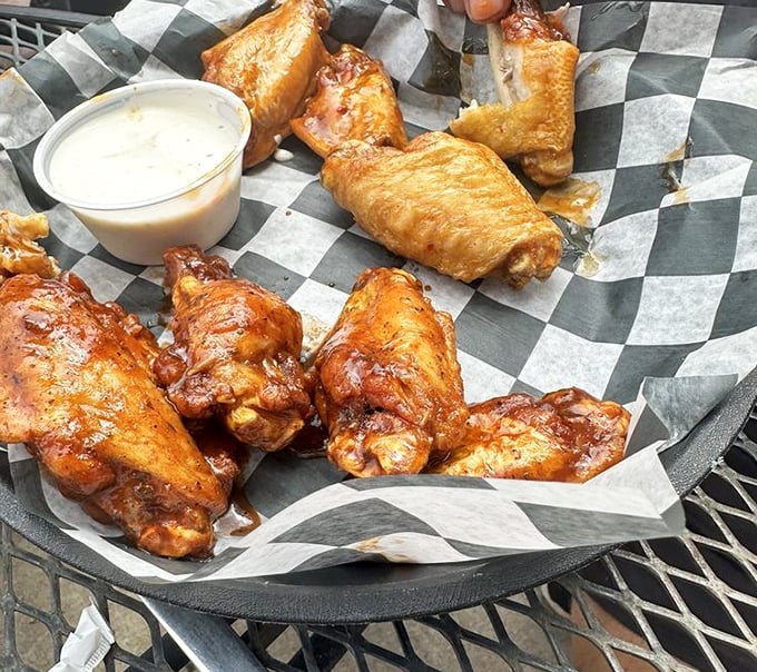 Wings that make you wonder why chickens don't rule the world. Crispy, saucy, and served with the necessary cooling agent – they're finger-licking philosophy on a plate.