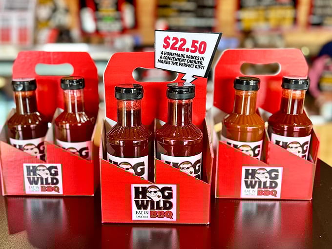 Those bottles of house-made sauce aren't just condiments; they're liquid treasure that transforms good barbecue into an unforgettable experience.