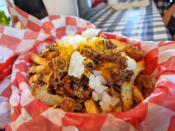 Chili cheese fries that laugh in the face of diet plans. A glorious mess of crispy potatoes, savory chili, and melted cheese.