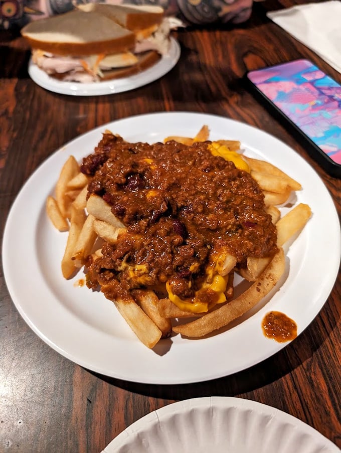 Chili cheese fries that laugh in the face of diet plans. That molten cheese and hearty chili aren't just toppings—they're a declaration of delicious defiance.