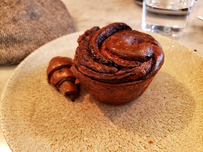 The chocolate babka's hypnotic swirls aren't just for show—each bite delivers a perfect balance of rich chocolate and tender dough that might just ruin you for lesser pastries.