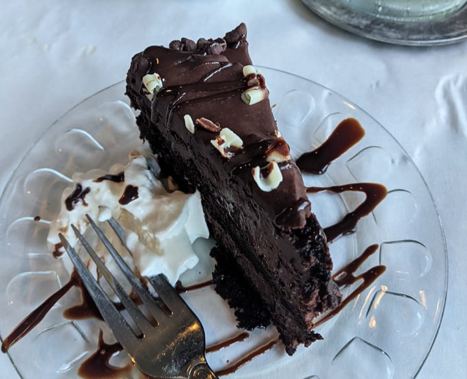 This chocolate cake doesn't just satisfy cravings—it creates new ones. The kind of dessert that makes you consider skipping straight to the final course.