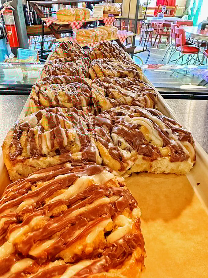 Cinnamon rolls drizzled with chocolate that don't just satisfy your sweet tooth—they make it write thank-you notes to your taste buds.