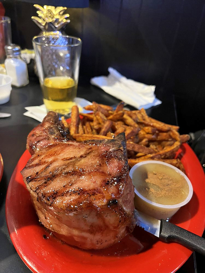 That pork chop isn't messing around. Perfectly seared, gloriously thick, with seasoned fries that didn't come from a freezer bag.