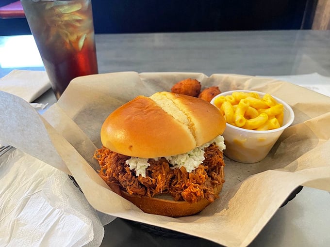 A sandwich that requires both hands and several napkins. That mound of chopped chicken with slaw is what lunch dreams are made of. 