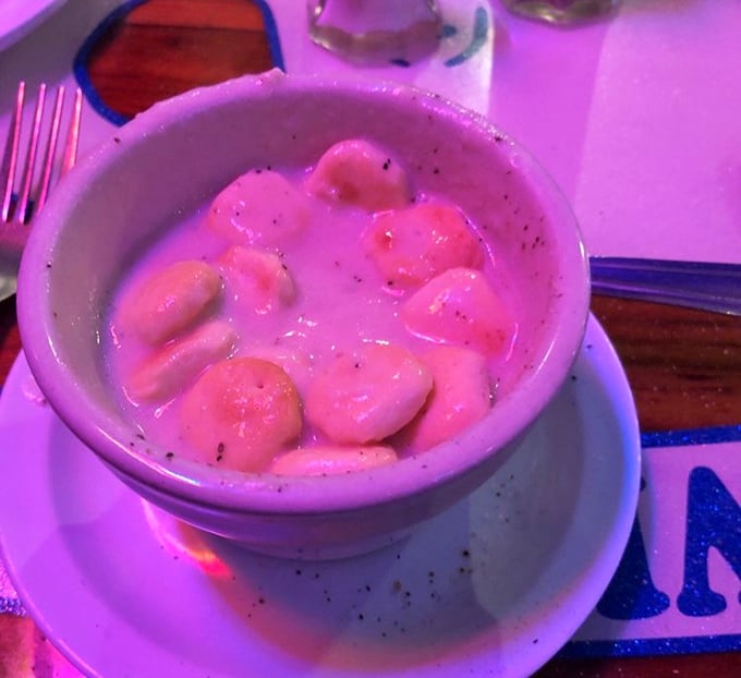 Chunks of seafood swimming in creamy broth—this isn't just soup, it's an underwater expedition for your taste buds. Worth every calorie.