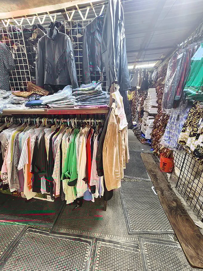 Fashion finds for every taste hang in organized chaos—leather jackets and summer dresses waiting for their second act in someone's wardrobe.