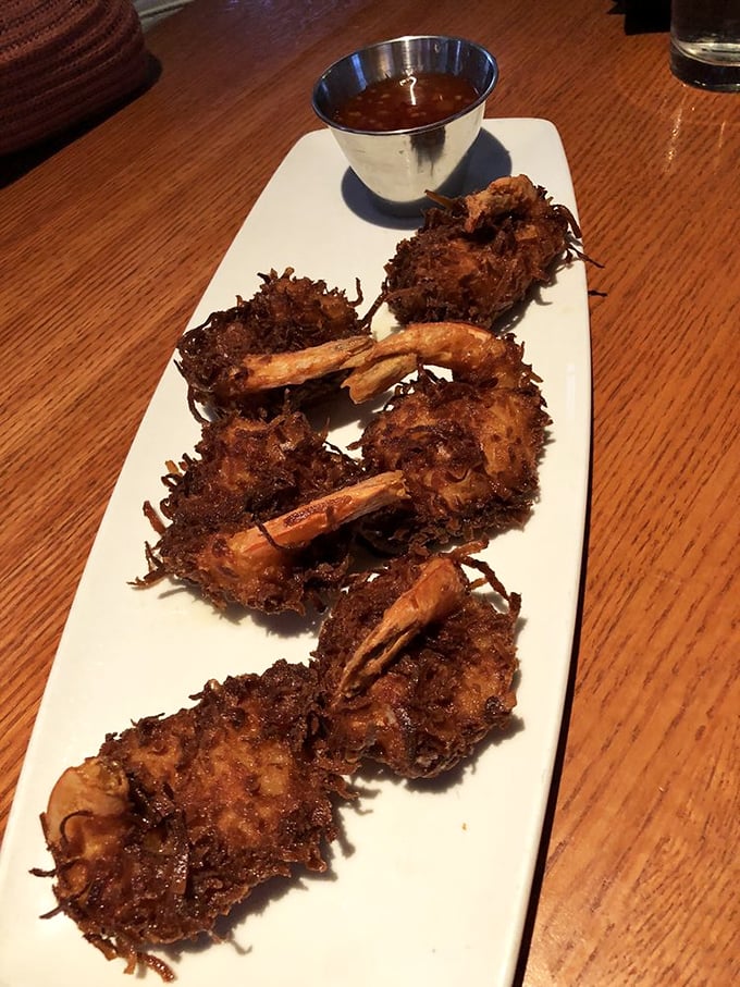Coconut shrimp that would make a tropical island jealous. The crispy exterior gives way to succulent shrimp—a textural masterpiece worth every calorie.