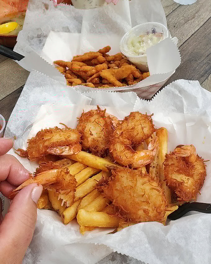Golden coconut shrimp and crispy clam strips—proof that sometimes the best things in life come in paper-lined baskets with fries.