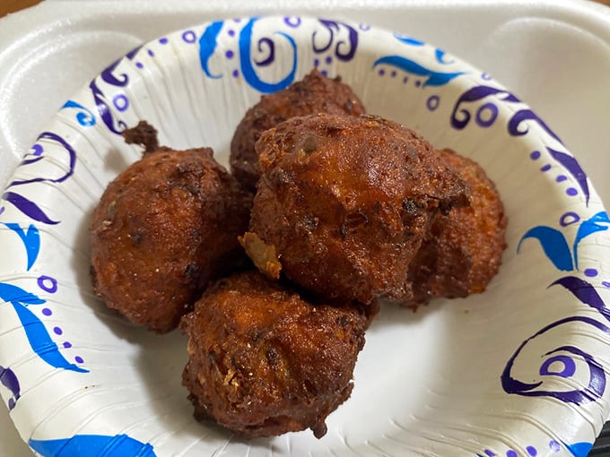 Conch fritters arrive like crispy little clouds that decided to vacation in your mouth.