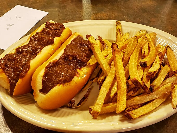 The legendary Coney dogs with that secret-recipe sauce—two perfect specimens flanked by hand-cut fries that make fast food chains weep with inadequacy.