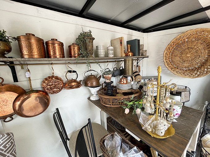 Copper cookware gleams with promise—each patina-rich piece telling stories of meals past while awaiting new culinary adventures.