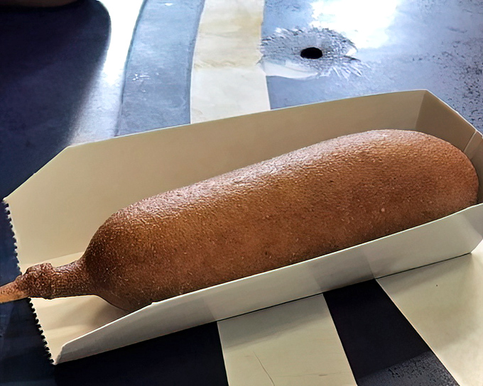 The Corn Dog – childhood nostalgia on a stick, golden-brown perfection that makes you wonder why you ever grew up.