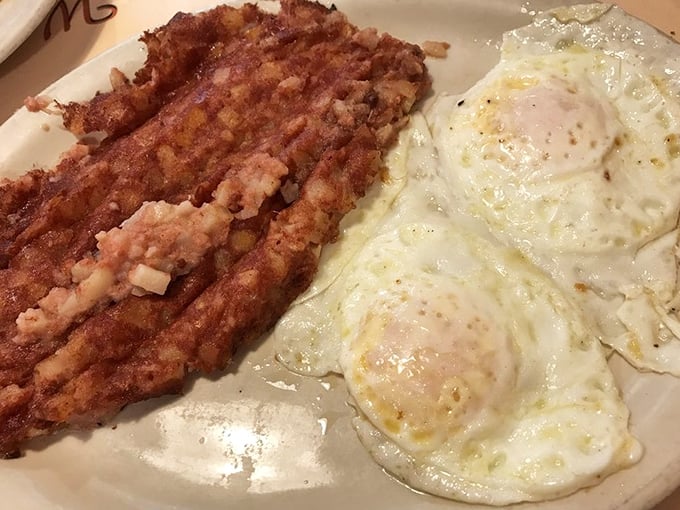 When hash browns achieve that perfect crisp-to-tender ratio, angels sing. Add perfectly cooked eggs and you've got breakfast harmony on a plate.