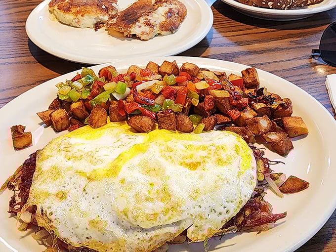 A proper diner hash—where potatoes, peppers, and eggs unite in a breakfast symphony that Mozart himself would have composed had he been a short-order cook.