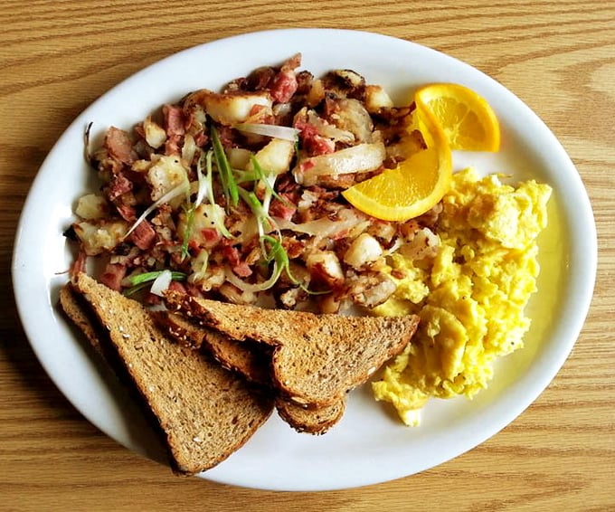 The corned beef hash—crispy edges, tender centers—is the breakfast equivalent of finding an extra $20 in your winter coat pocket.