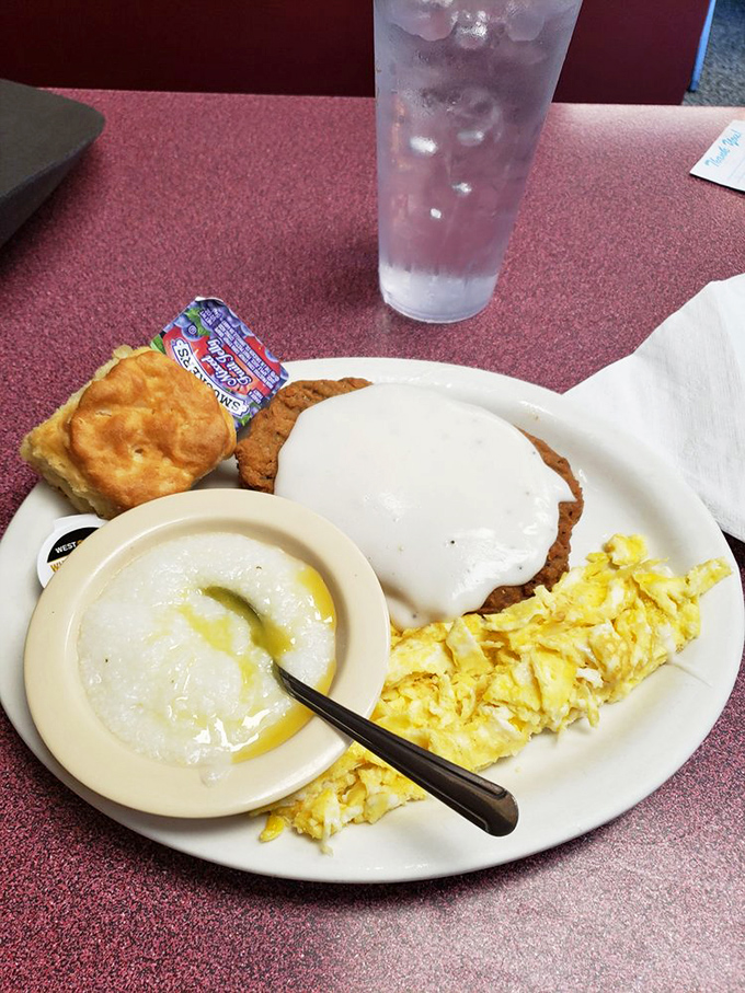 Grits, eggs, and country-fried steak—the breakfast equivalent of a warm hug from your favorite aunt who doesn't judge your life choices.