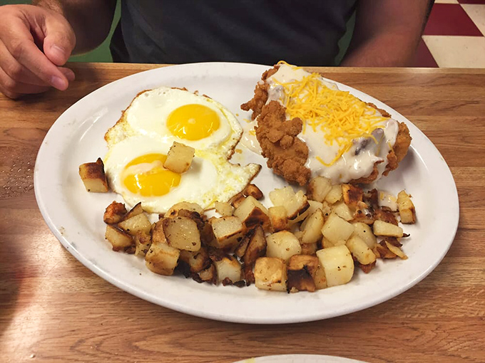 Breakfast meets dinner in this country-fried chicken and eggs plate—a hearty feast that says "you might want to cancel your afternoon plans."