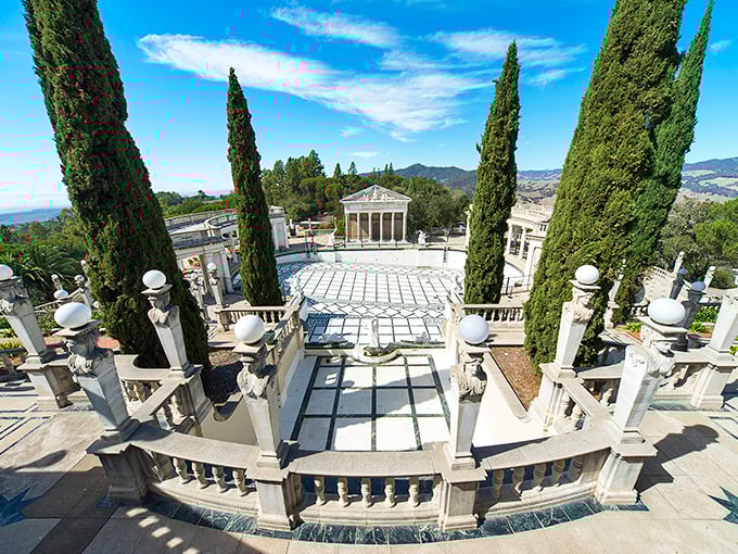 Classical columns frame this stunning terrace view, creating the perfect stage for contemplating life's big questions or just showing off to your friends.