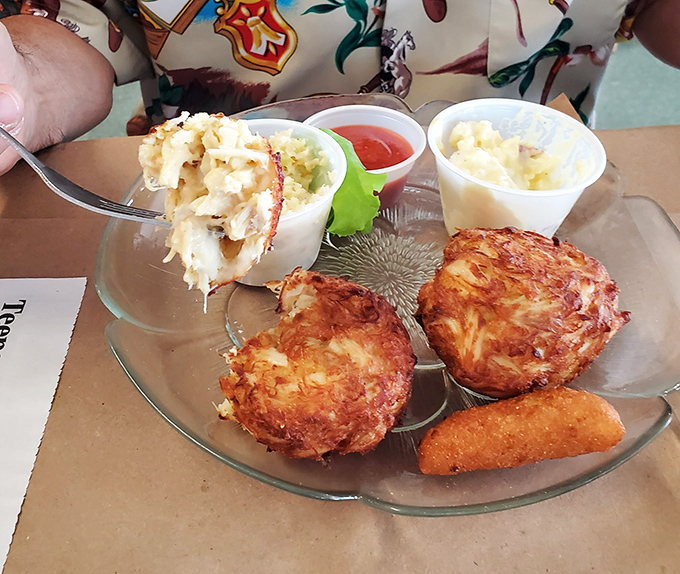 These golden-fried crab cakes contain more actual crab than filler—a rare and beautiful thing in today's world. That's not cooking; that's respect.