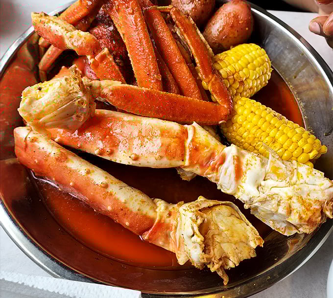 King crab legs splayed majestically in their crimson glory—the seafood equivalent of rolling out the red carpet for your taste buds.