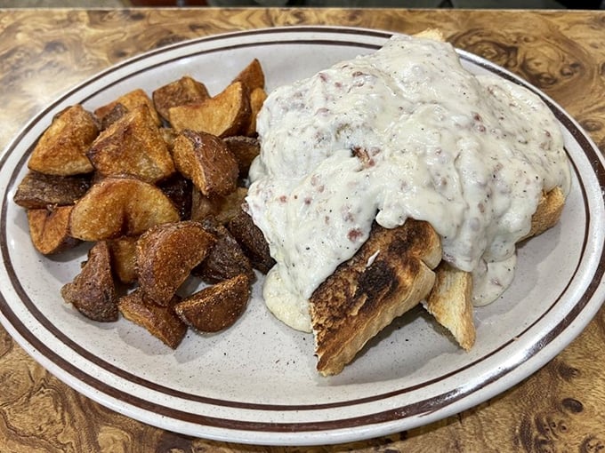 Creamed chipped beef – the dish your grandfather loved gets a respectful update here, smothering golden toast with velvety sauce alongside perfectly crisped breakfast potatoes.