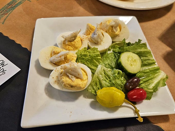 These aren't your average deviled eggs – they're dressed for a fancy night out with seasoning that whispers, "Welcome to Maryland, hon."