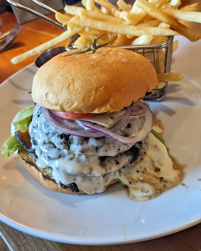 The burger that launched a thousand diet cheat days. Melty cheese cascading down double patties—resistance is both futile and foolish.