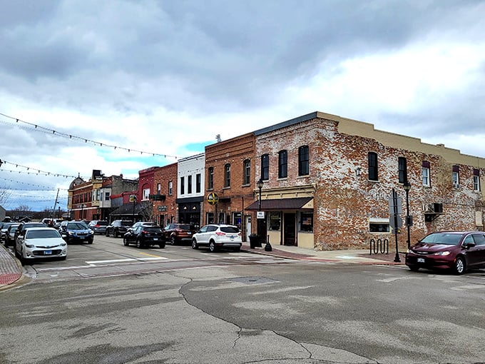 Downtown Utica's string lights aren't just decoration—they're an invitation to linger as evening falls on these historic storefronts.
