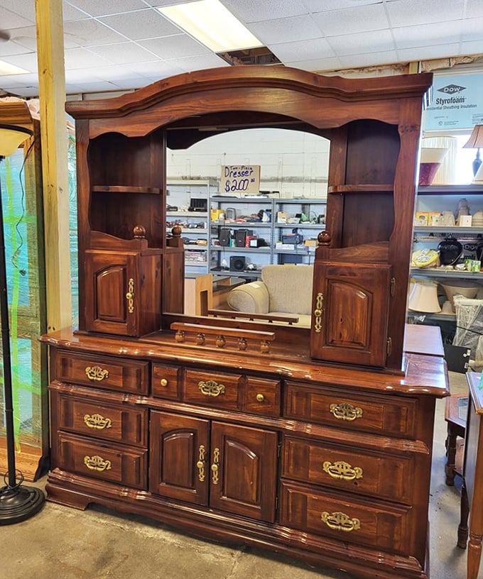 This solid wood dresser with ornate details screams craftsmanship from an era when furniture lasted generations.