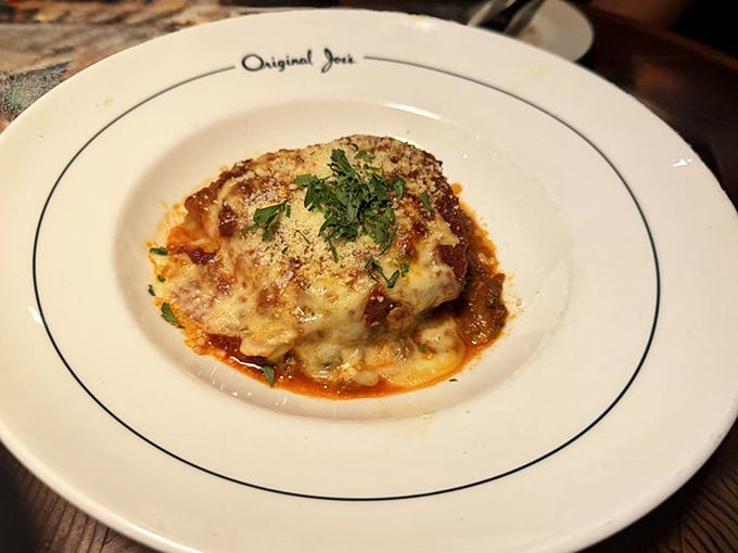 Eggplant Parmigiana that doesn't hide behind pretension—just layers of tender eggplant, bubbling cheese, and a marinara sauce worth writing home about.
