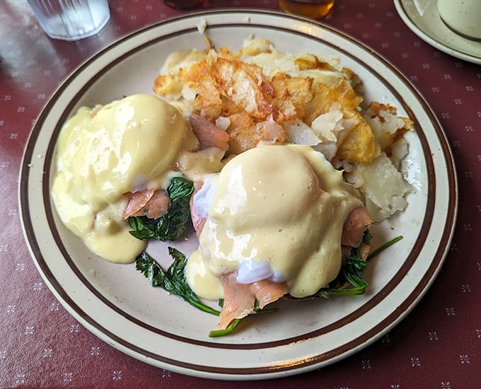 Eggs Benedict done right – with velvety hollandaise cascading down like a yellow waterfall of breakfast bliss. Worth getting out of bed for.
