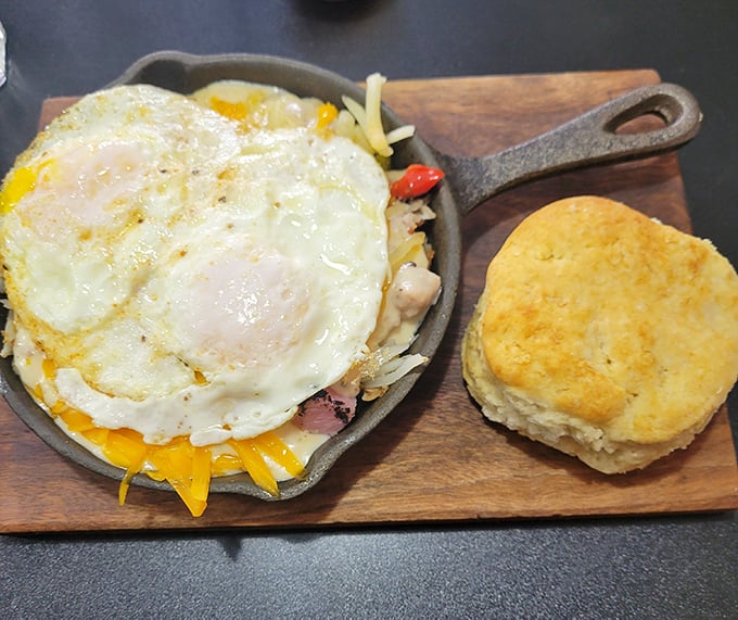 Breakfast served in a cast iron skillet—because when eggs, cheese and potatoes meet hot iron, magic happens and diets are forgotten.