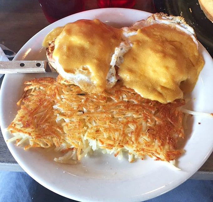 Eggs Benedict with perfectly crispy hash browns – the breakfast equivalent of wearing a tuxedo with really comfortable shoes.