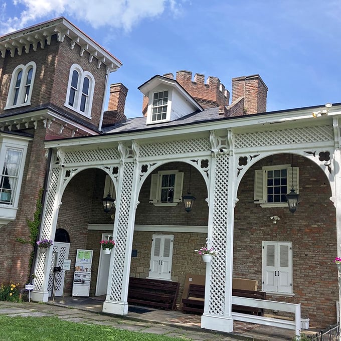 Ornate Victorian details and a welcoming porch invite visitors to step back in time at this meticulously preserved historic building.