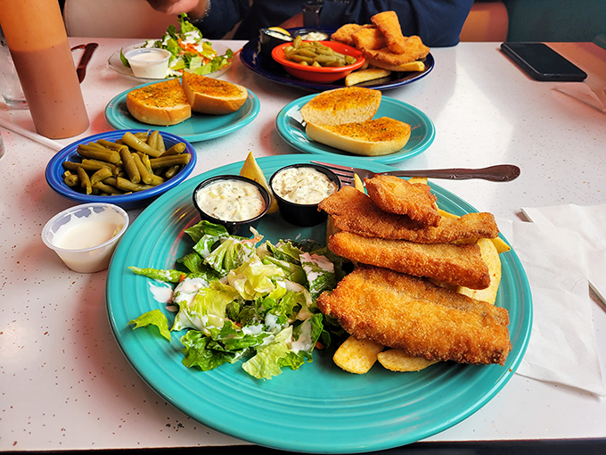Fish and chips that could make a British pub jealous, with that golden batter crunching like autumn leaves under your fork.