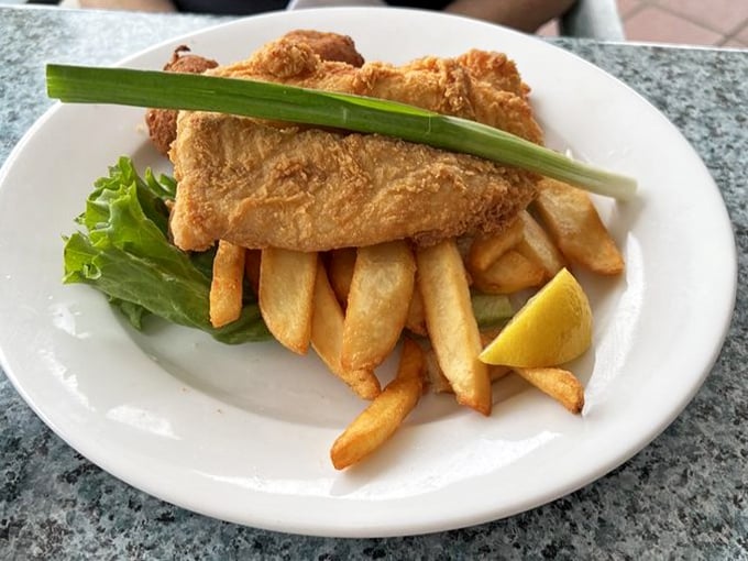 Fish and chips that would make even the most stoic Brit shed a patriotic tear. Golden, crispy, and worth every calorie.
