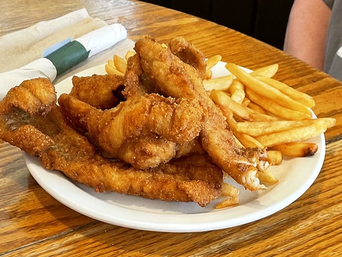 Golden-fried fish and perfectly crisp fries—the kind of basket that makes you wonder why anyone bothers with fancy white tablecloth dining.