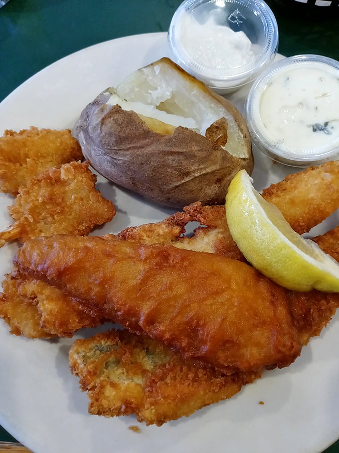 The fish fry here isn't just a meal, it's a masterclass in the art of the perfect batter—crispy, light, and worthy of its own fan club.