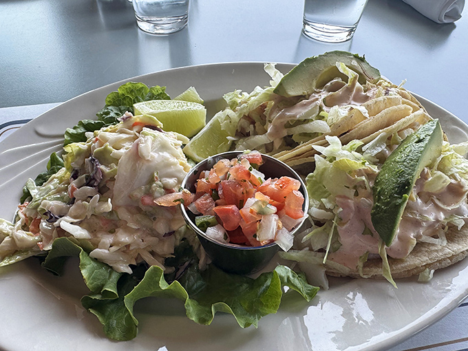 Fish tacos dressed for success with fresh lime and pico de gallo. Baja California's gift to the world, perfected in Bodega Bay.