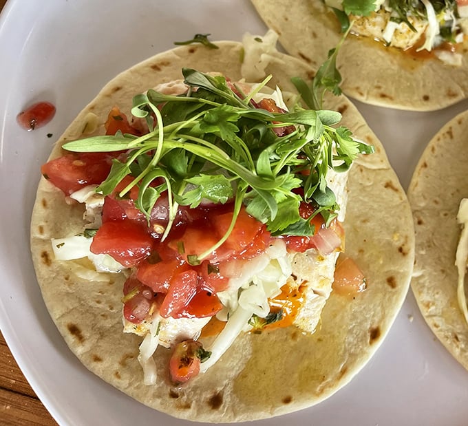 These fish tacos aren't just a meal, they're a vacation on a plate – fresh, vibrant, and begging to be paired with something cold and refreshing.