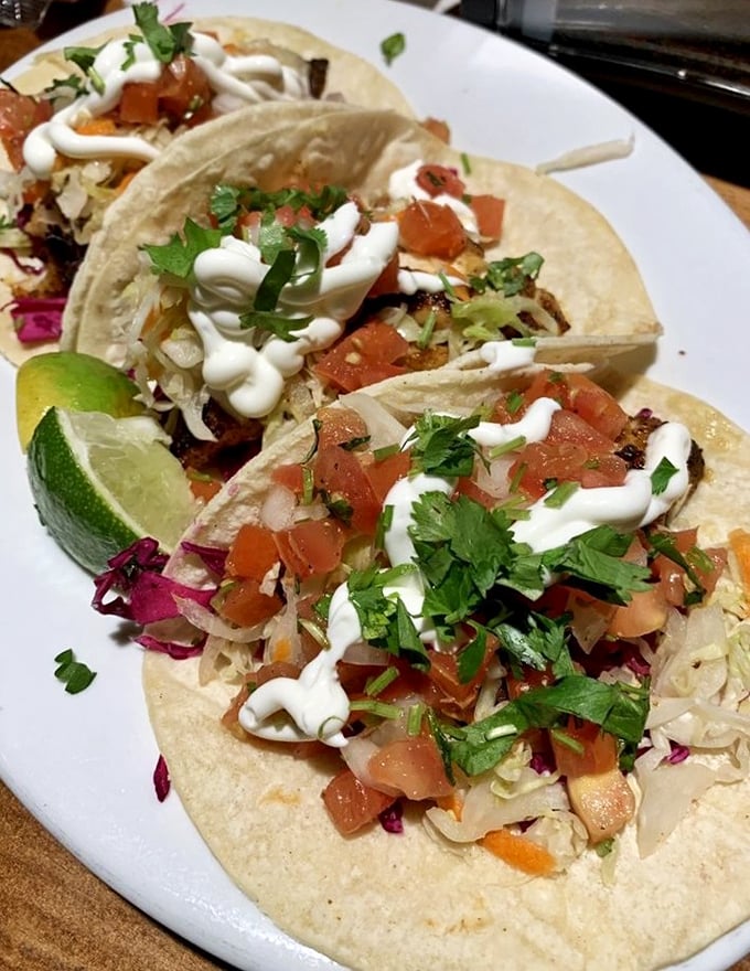 Fish tacos dressed for success with fresh toppings and a squeeze of lime—like a beach vacation wrapped in a tortilla.
