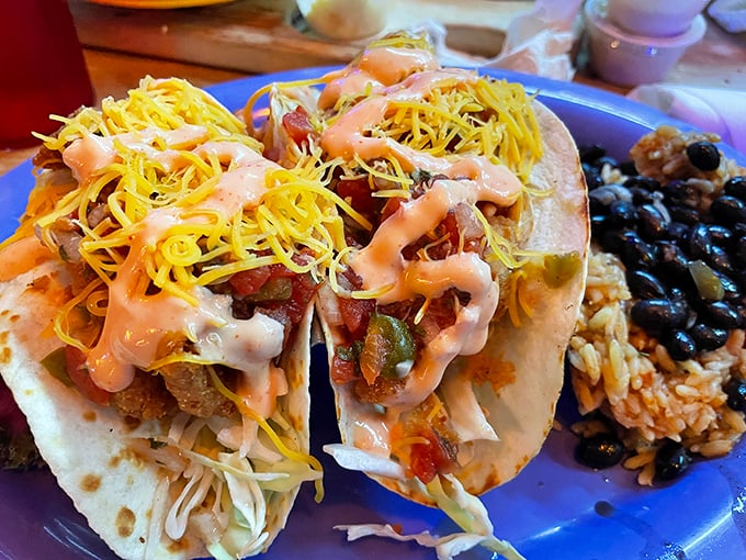 Tacos that tell a story of sea and land coming together in perfect harmony, with a side of beans that didn't come from any can.