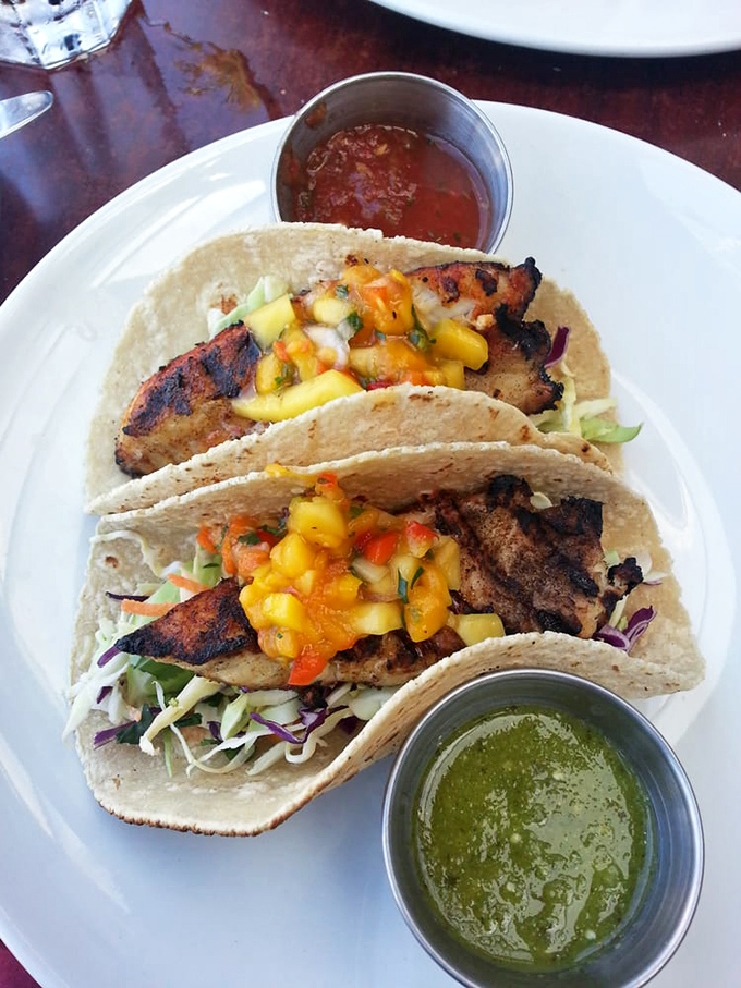 Fish tacos that bring the beach to your palate. Fresh mango salsa and two sauces because choosing just one would be cruel and unusual punishment.