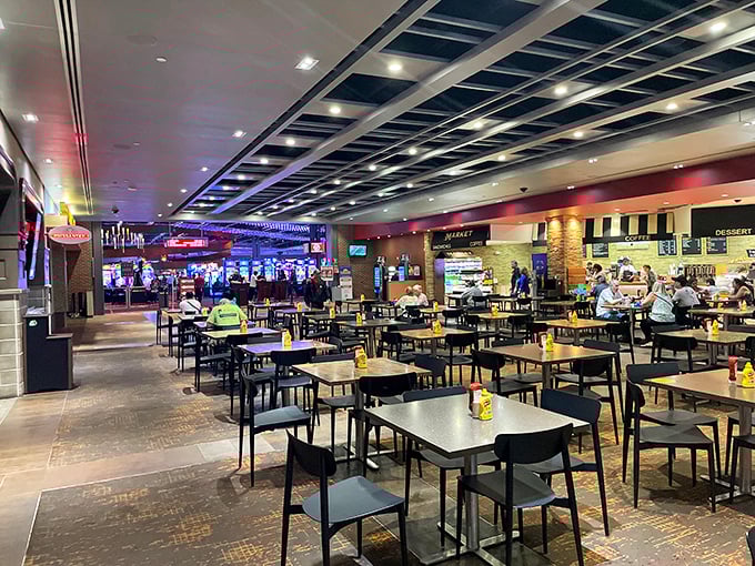 The mall's interior design preserves industrial elements while creating a modern shopping experience, where exposed ceilings meet polished floors in perfect harmony.