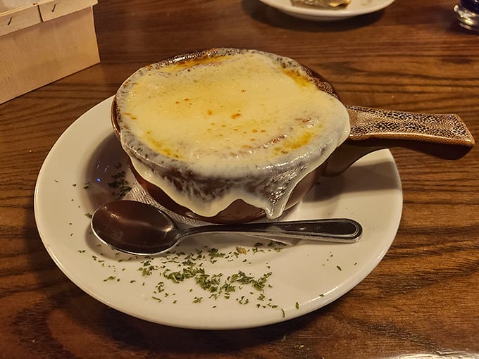 French onion soup that doesn't just warm your body—it hugs your soul with a blanket of bubbling cheese and rich, savory broth.