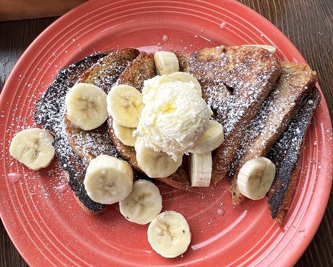 French toast that makes you question why you ever settled for lesser versions. Those bananas aren't just toppings—they're supporting actors in a breakfast blockbuster.