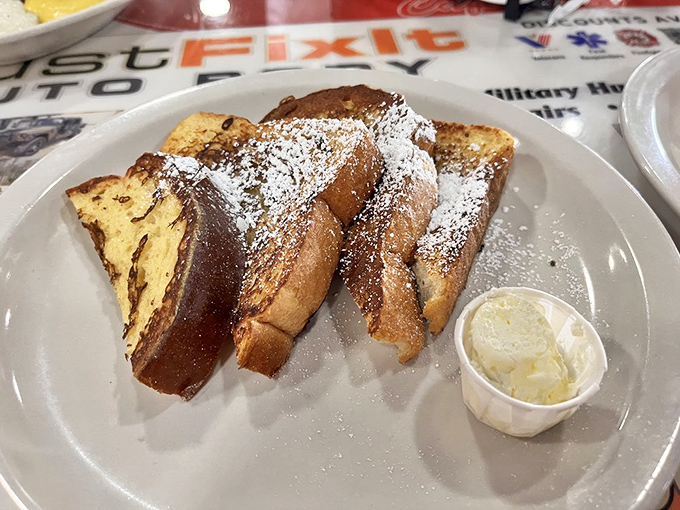 French toast dusted with powdered sugar and served with a side of butter. Simple pleasures that make Monday mornings bearable again.