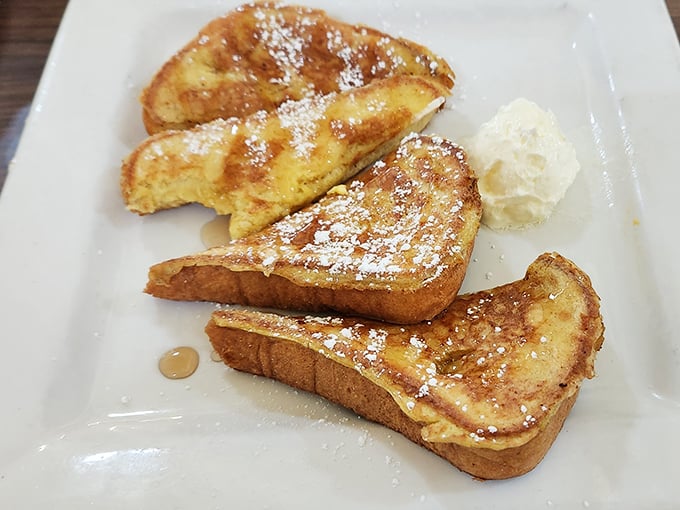 Golden French toast dusted with powdered sugar – simple perfection that would make even your grandmother nod in approval.