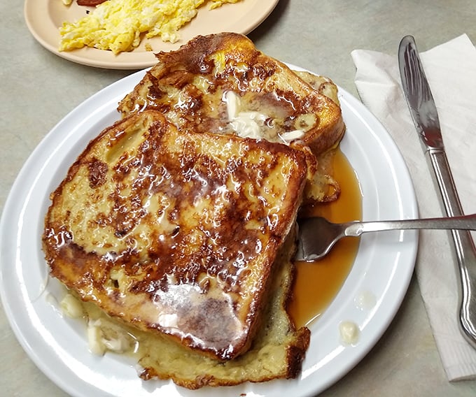 French toast that makes bread fulfill its highest purpose. Soaked, griddled, and swimming in syrup – breakfast's answer to dessert.